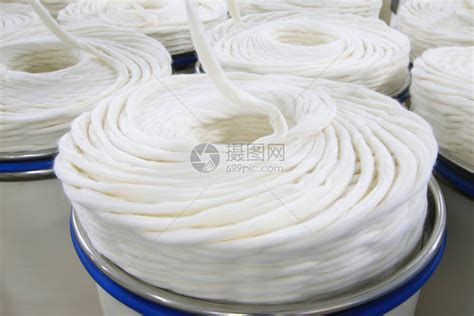 纺织车间线轴堆积在一起整齐排列高清图片下载 正版图片506478350 摄图网