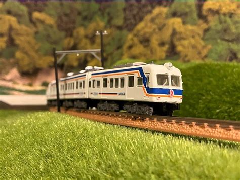 南海電気鉄道 21000系 新塗装 京阪神急行Ameba支店