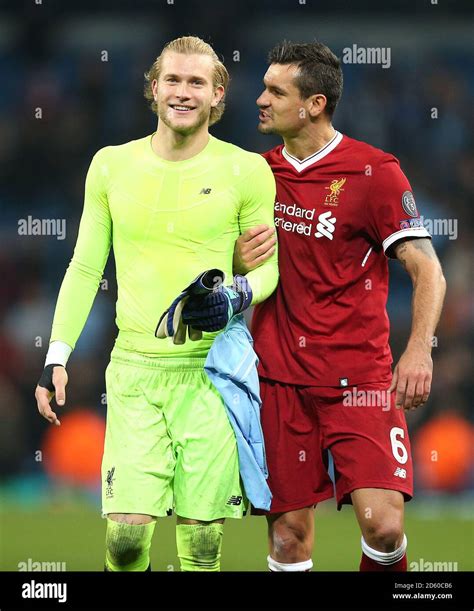 Liverpool Goalkeeper Loris Karius And Dejan Lovren Celebrate After The