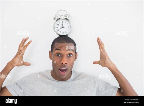 Man With Clock Hi Res Stock Photography And Images Alamy