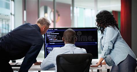 Diverse Programmer Team Efficiently Coding Agile Projects Stock Image