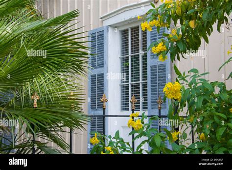 Window Architecture With Yellow Flowers In Key West Florida Usa Stock