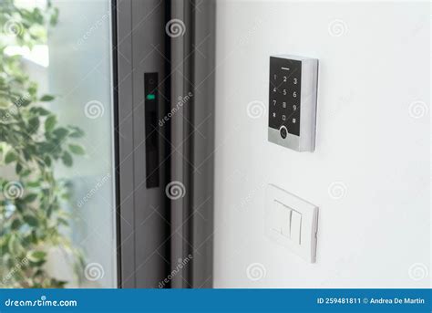 Man Setting An Alarm Code For Home Security Stock Image Image Of Control Innovation 259481811