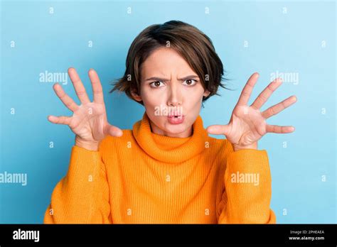 Photo Portrait Of Attractive Young Woman Raise Hands Frighten Boo Funky