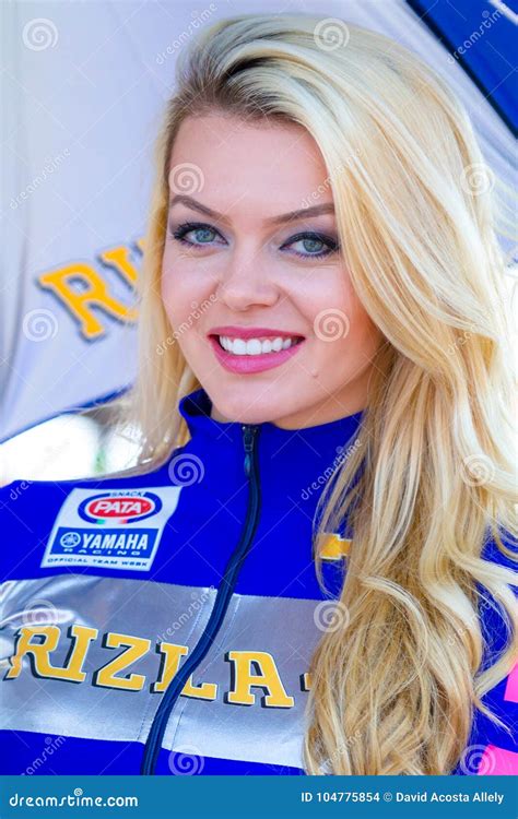 The Grid Girl Announces A Five Minute Readiness Before The Start