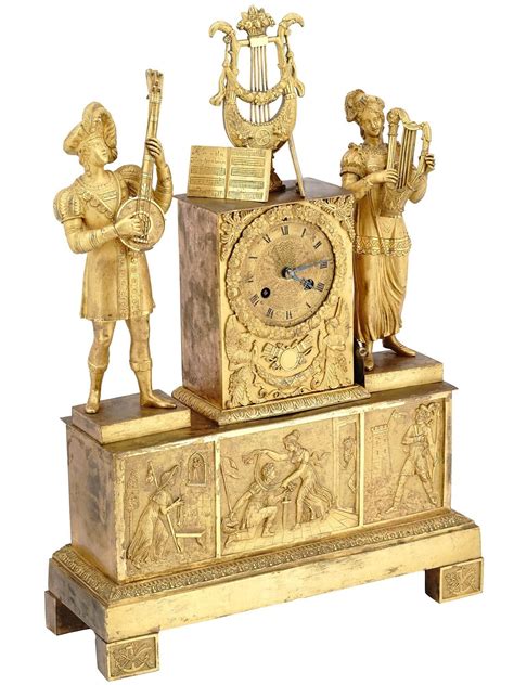 19th Century French Empire Gilt Bronze Mantel Clock With Musical Theme
