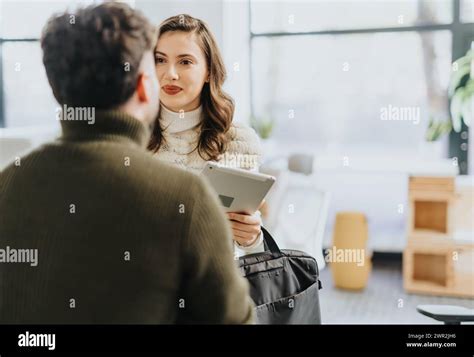 Diverse Business Team Analyzing Stats Brainstorming Ideas And Collaborating For Growth In The