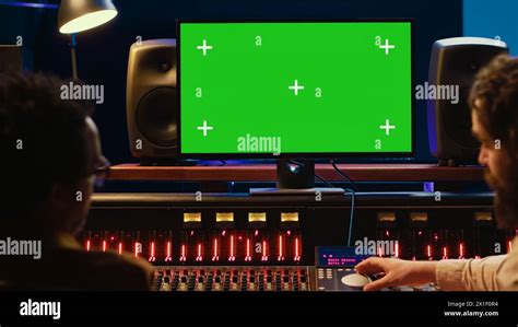 Diverse Skilled Artists Working With Isolated Mockup Display On Pc Mixing And Mastering Tracks