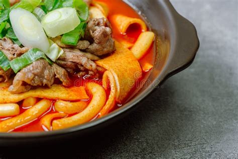Tteokbokki Stir Fried Rice Cake Korean Food On A Black Plate Stock