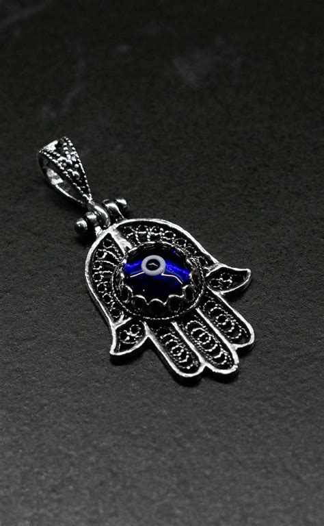 Mano de Fatima con Ojo Turco Azul Amuletos y Pulseras Esotéricas