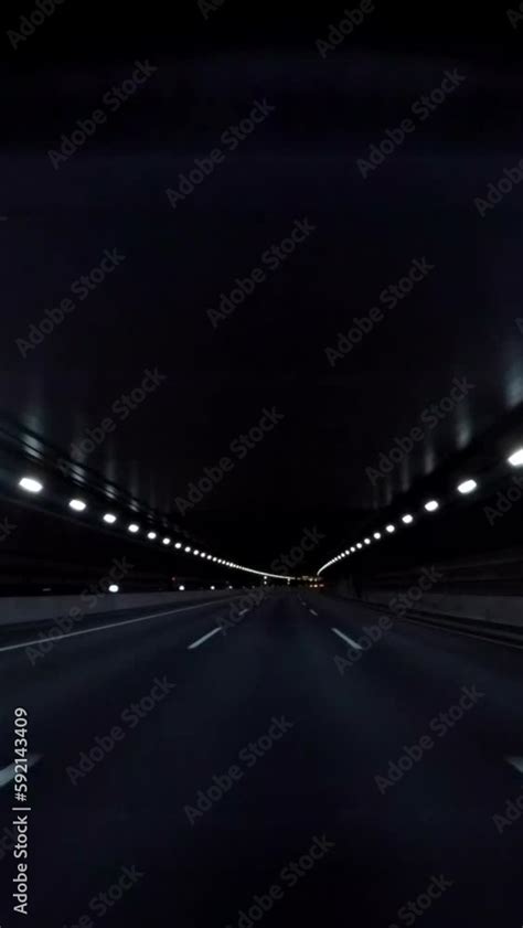 高速道路のトンネル内を走行する車からの車載映像の縦動画 Stock Video Adobe Stock