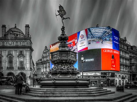 Download Greyscale Piccadilly Circus With Colored Screen Wallpaper