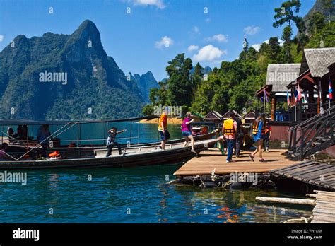 Guests Arrive At NANG PRAI RAFT HOUSE On CHEOW EN LAKE In The KHAO SOK