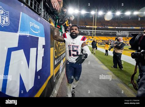 New England Patriots Running Back Ezekiel Elliott Heads Off The Field