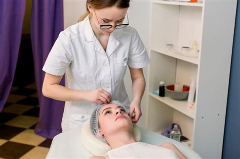 Portrait Of Young Beautiful Woman In Spa Salonspa Body Massage