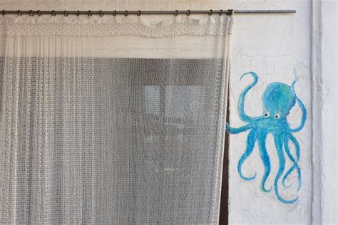 Traditional White Mediterranean Building Facade Decorated With An Octopus Nobody Stock Image