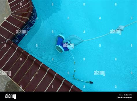 Polaris Vac Sweep Pressure Cleaner Working In A Swimming Pool Stock Photo Alamy