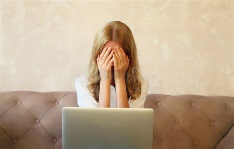 Desperate Upset Crying Young Woman With Headache Touching Her Head And