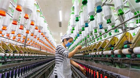 Chinas November Factory Output Rises For 8th Straight Month