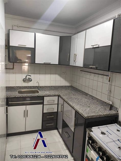 مطابخ الوميتال 01003061236 مطابخ يوفي اسود و ابيض Uv مطابخ اكريليك