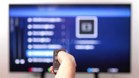 Man With Remote Control And Naked Woman Lying On The Bed Stock Footage