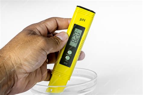 Premium Photo Ph Meter Widely Used To Measure The Exact Level Of Ph In Marine Aquarium Water