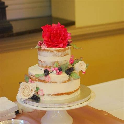 Semi Naked Wedding Cake Decorated Cake By Cakes Abound Cakesdecor