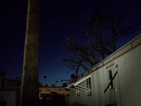 Tree Lands On Mobile Home Following Storms