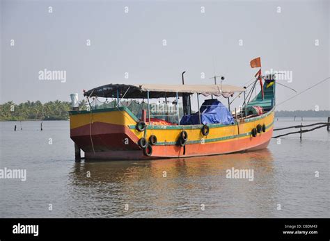 A Fishing Boat Parked In The Middle Of River At Alleppy Kerala India