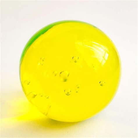 Uranium Vaseline Glass Paperweight Sphere With Bubbles Depression