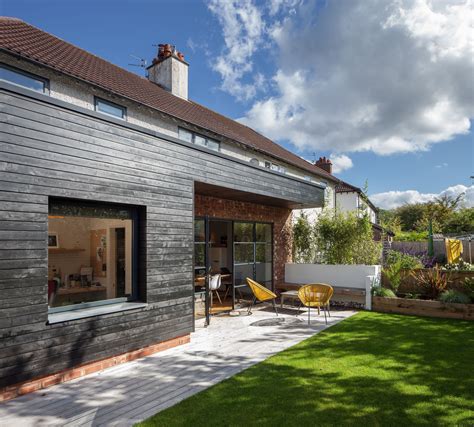Stained Larch Timber Cladding Exterior Modern Single Storey Extension To A House In A
