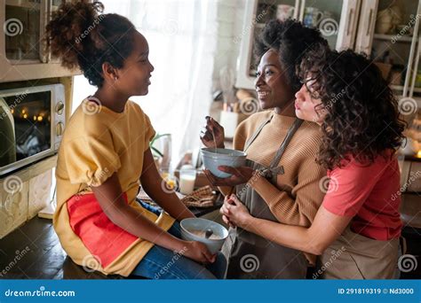 Multiethnic Homosexual Female Lesbian Couple With Daughter Spending