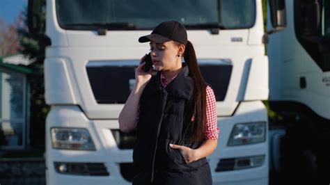 Female Truck Driver Managing Tasks Via Phone On Parking 56285747 Stock
