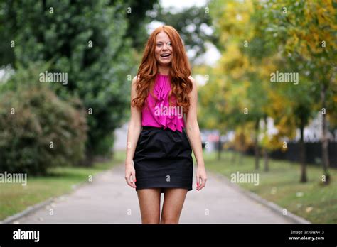 Beautiful Redhead Woman In A Dress Stock Photo Alamy