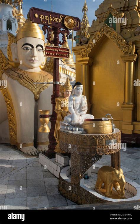 Myanmar Yangon Shwedagon Paya Offerings Being Made At Planetary Post