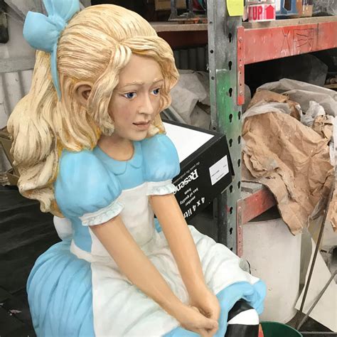 Alice Sitting Sculpture And Statue