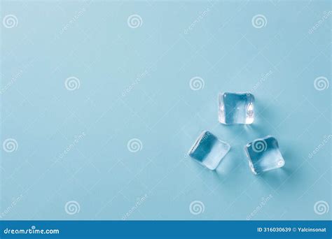 Top View Of Ice Cubes Of Different Sizes On Blue Background Stock Image