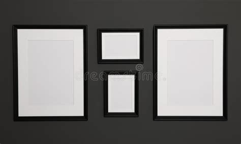 Empty Frames On Black Wall Mockup For Design Stock Illustration