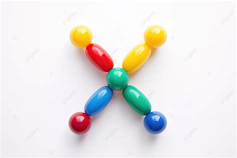 白色表面上字母 X 形狀的彩色明亮球 X 象徵 圖釘背景圖片和桌布免費下載