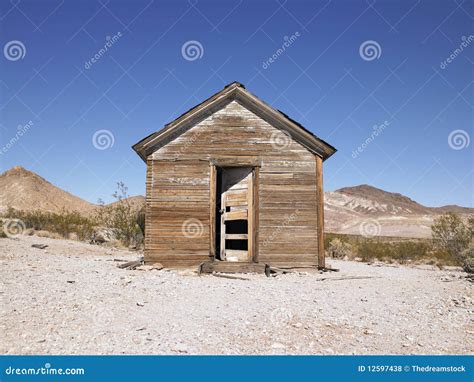 Abandoned House In Desert With Open Door Royalty Free Stock Photos