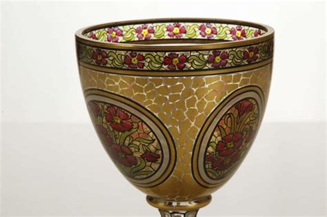 A Bohemian Gilded And Enamelled Schwarzlot Glass Goblet By J