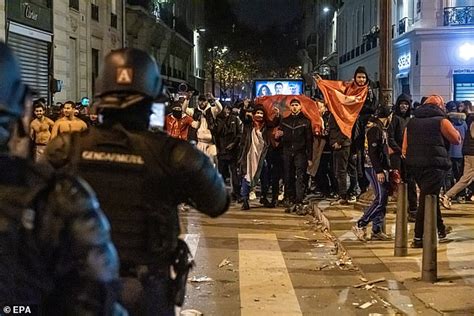 French Police Fire Tear Gas At Football Fans In Paris And Arrest At
