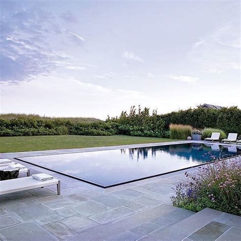 Infinity Edge Pool Design With Lounge Chairs Hamptons Pool Design