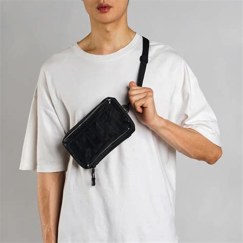 Premium Photo Stylish Cowo Dengan Tas Yang Keren Simplicity Meets