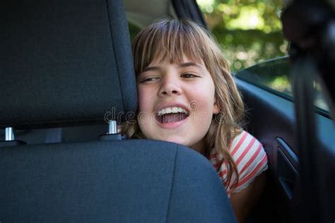 Teenage Girl Sitting In The Back Seat Of Car Stock Image Image Of