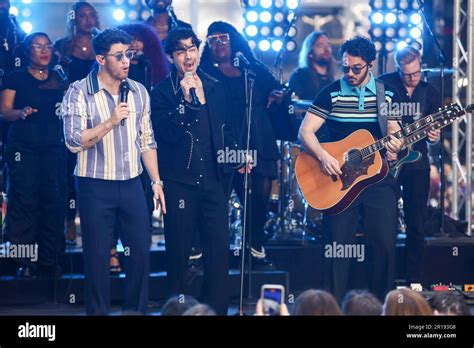 Nick Jonas From Left Joe Jonas And Kevin Jonas Of The Jonas Brothers Perform On Nbcs Today