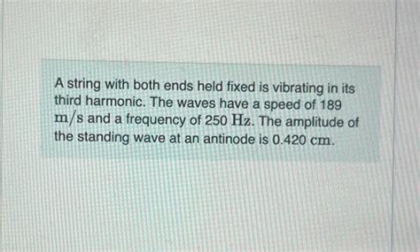 solved a string with both ends held fixed is vibrating in