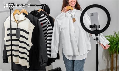 Fashion Blogger Recording Vlog About Clothes Female Blogger Or Stylist Standing In Front Of