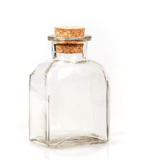 Premium Photo Close Up Of Glass Of Jar Against White Background