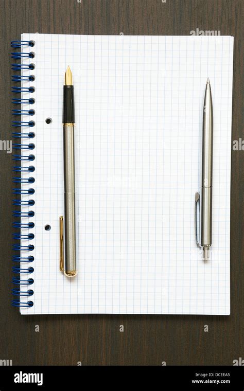 Pen On Notebook Background Stock Photo Alamy